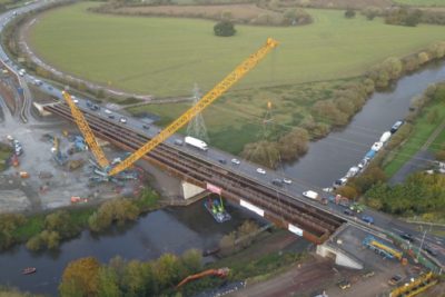 Deck installed on first weathering steel bridge - Construction Management